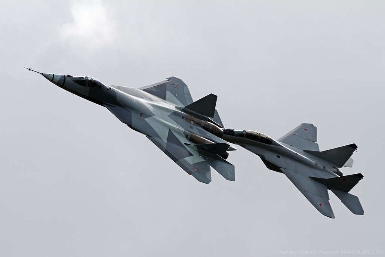 Russian T-50 PAK-FA fifth generation fighter flies alongside the MiG ...