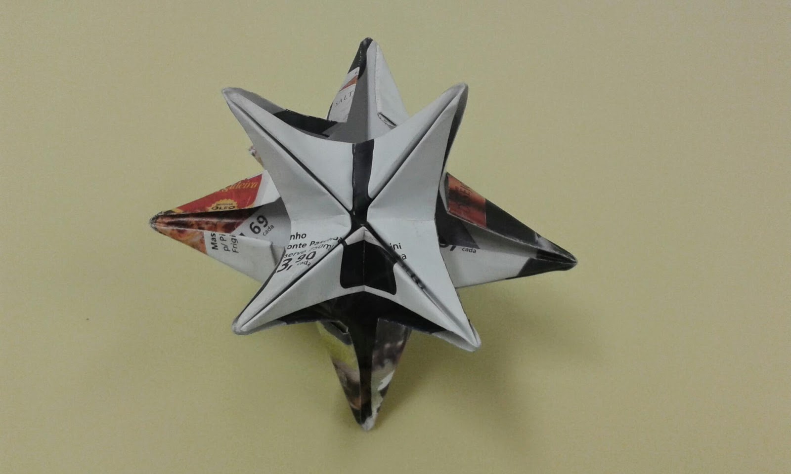 Origami Diario: 30/01/2015. Ômega Star, com uma só folha , de John Montroll