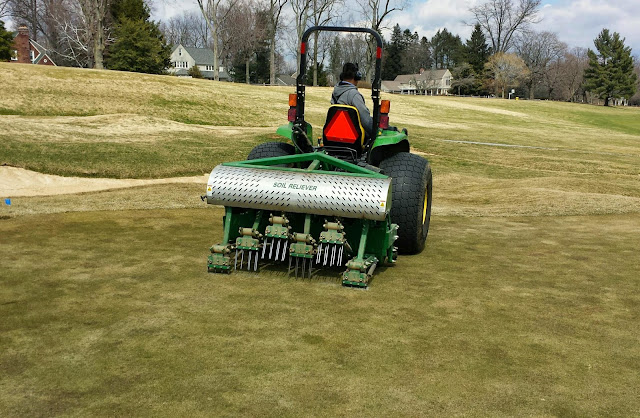 Kennett Square Golf and Country Club: Deep - tine aeration on greens