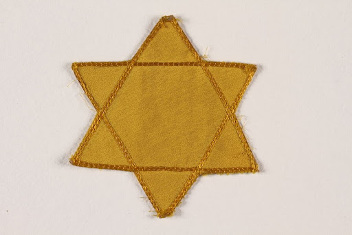 Yellow cloth Star of David badge with a blank center — Google Arts ...