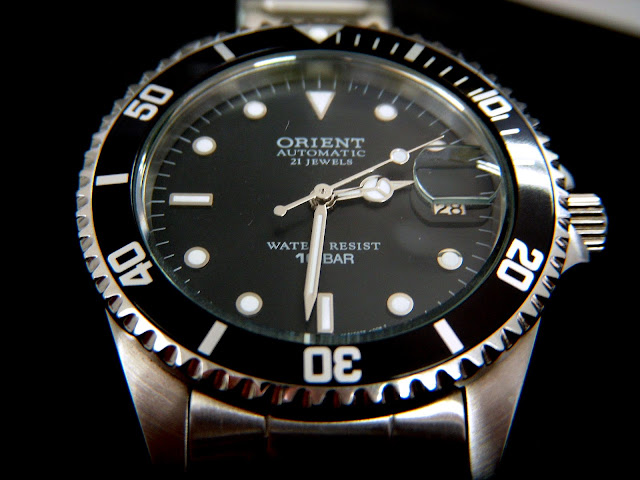 Picking a Sub: Alpha vs. Orient | WatchUSeek Watch Forums