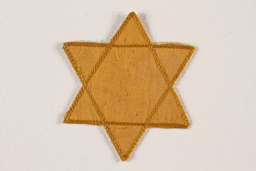 Yellow cloth Star of David badge with a blank center — Google Arts ...