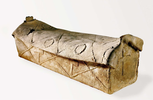 Christian coffin decorated with a rope design and Latin crosses ...